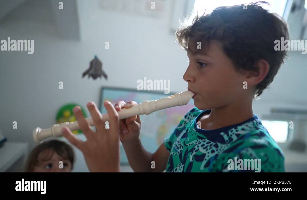 Kid playing instrument Stock Videos & Footage - HD and 4K Video Clips ...