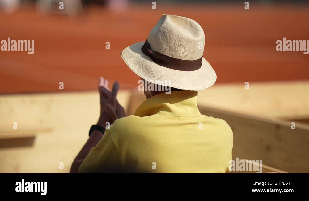 Spectator watching tennis match game clapping hands cheering from ...