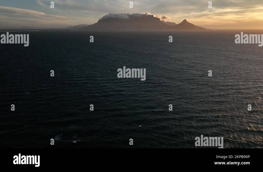 Epic cinematic drone reveal shot over Atlantic of iconic Table Mountain ... Epic cinematic drone reveal shot over Atlantic of iconic Table Mountain ...