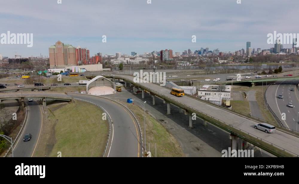 Tracking of yellow school bus passing on long elevated exit ramp of ...
