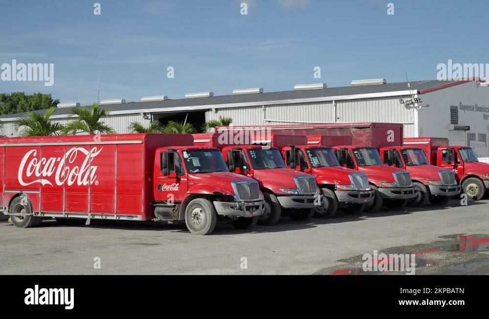 Row Of Parked Coca Cola Trucks At Distribution Centre In Punta Cana ...