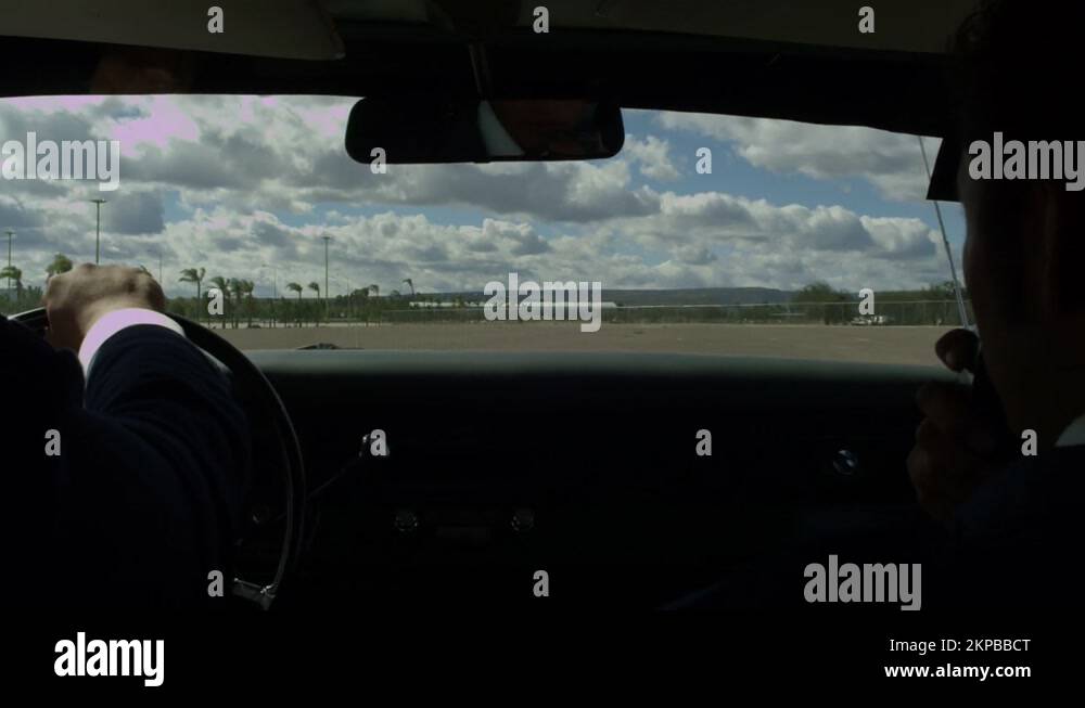 Old police cars in a high speed pursuit, driving zig zags and stopping ...