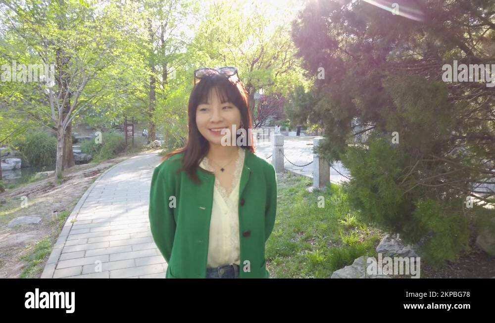 Chinese girl walking Stock Videos & Footage - HD and 4K Video Clips - Alamy