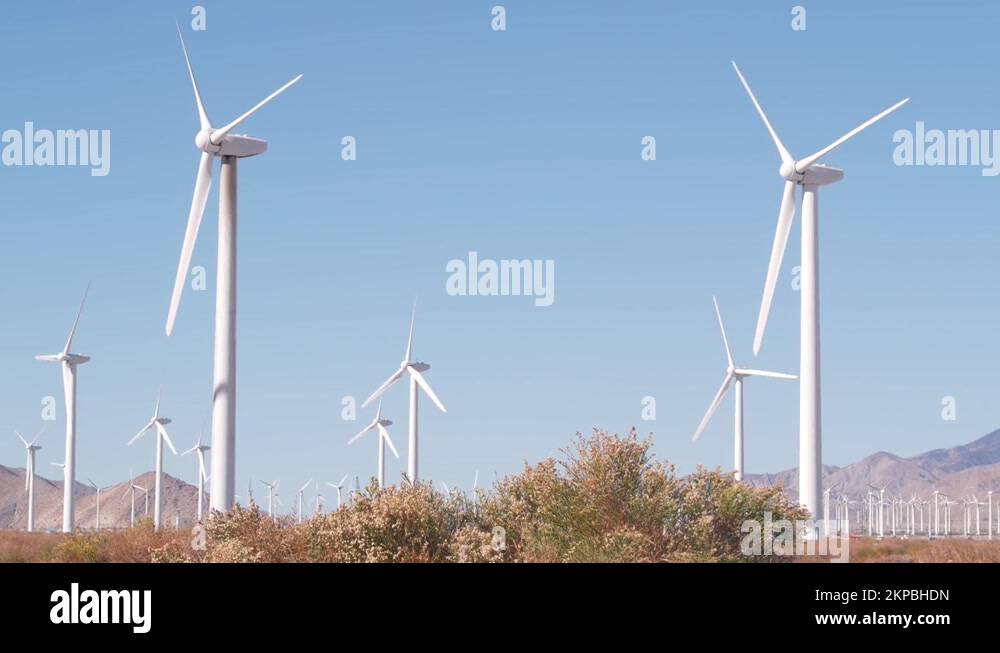 Windmills on wind farm, wind mill energy generators. Desert windfarm ...