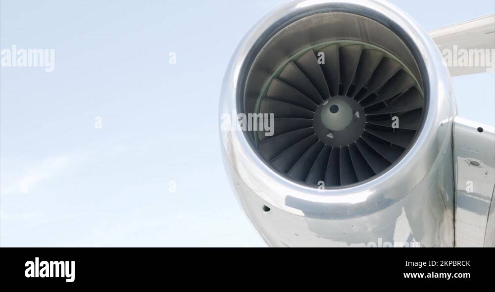 Close-Up Slow Motion Pan Of A Spinning Jet Engine Turbine And Blades ...
