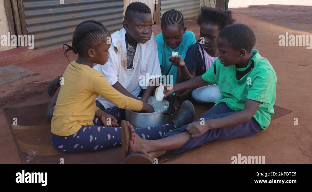 Poverty children eating outdoors Stock Videos & Footage - HD and 4K ...