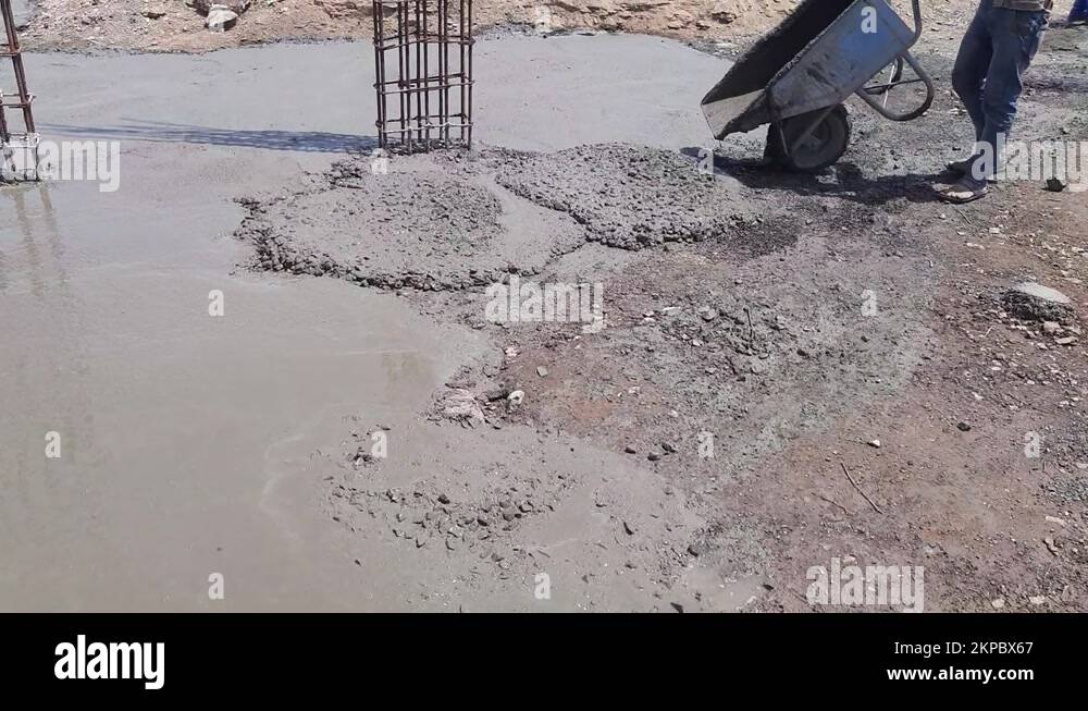 Pouring concrete mix on concreting formwork. Forming, an essential part ...
