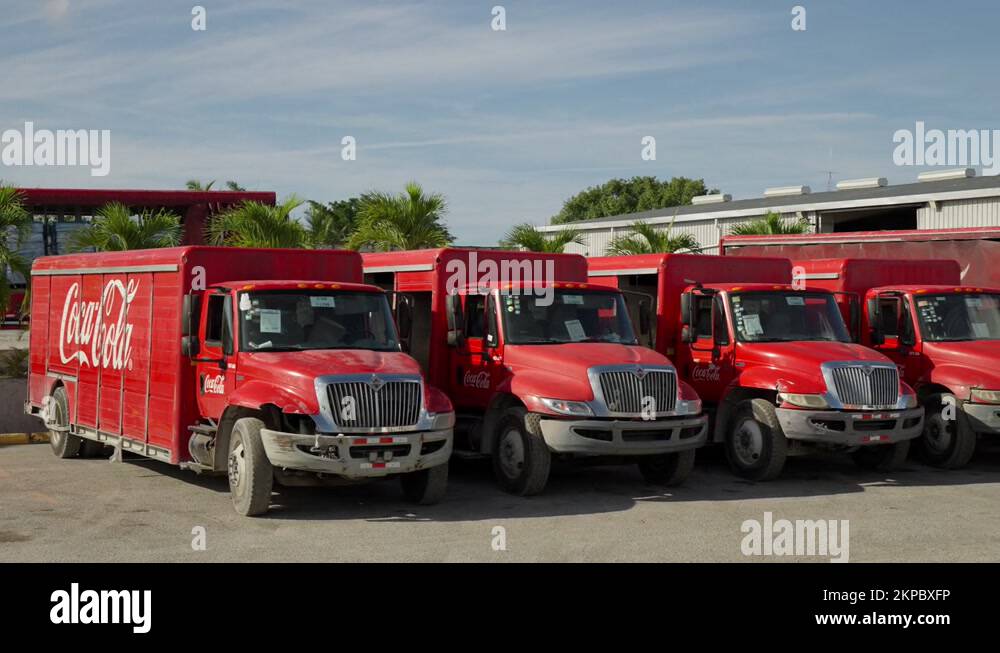 Row Of Parked Coca Cola Trucks At Distribution Centre In Punta Cana ...