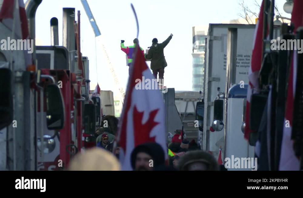 Freedom Convoy. Protesters raising their hands in victory. Canadian ...