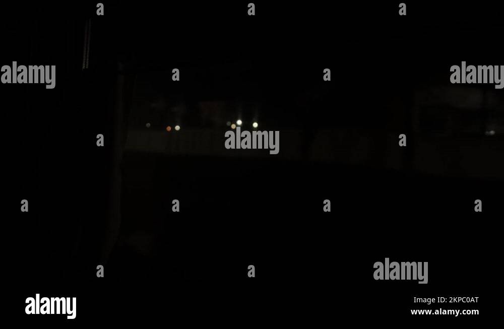 Inside dark compartment of corridor coach of railway passenger train at ...