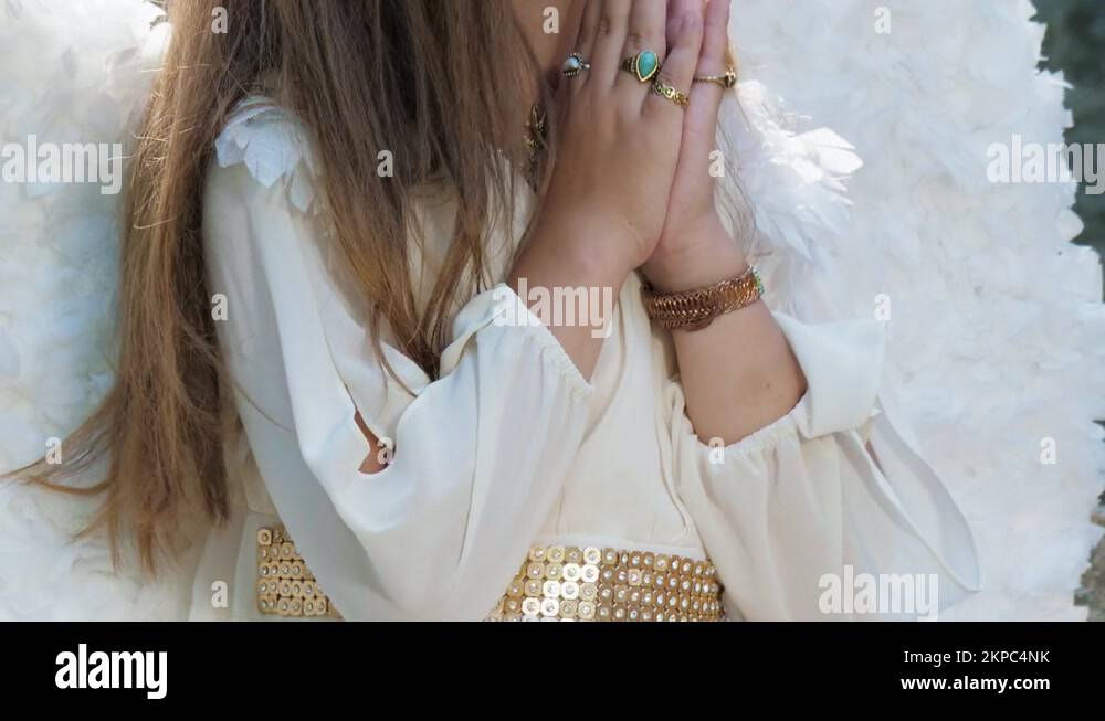 Angel at prayer Stock Videos & Footage - HD and 4K Video Clips - Alamy