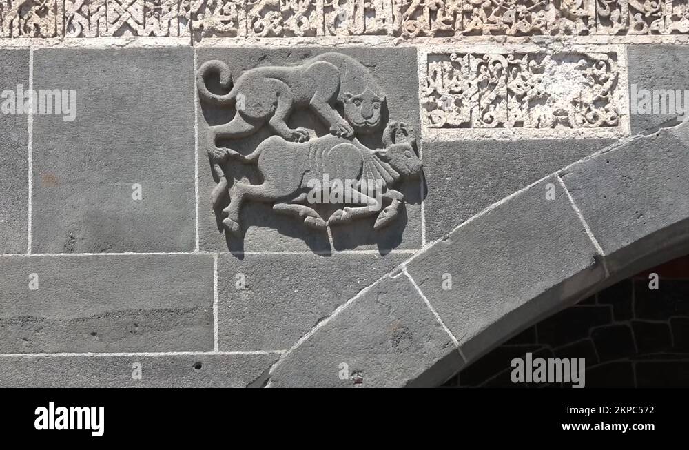 Carving on the wall in front of the Great Mosque of Diyarbakir Stock ...
