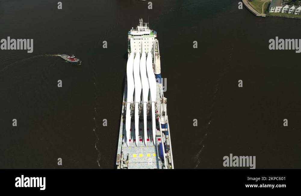 Heavy load cargo vessel ship carrying wind turbine blades Stock Video ...