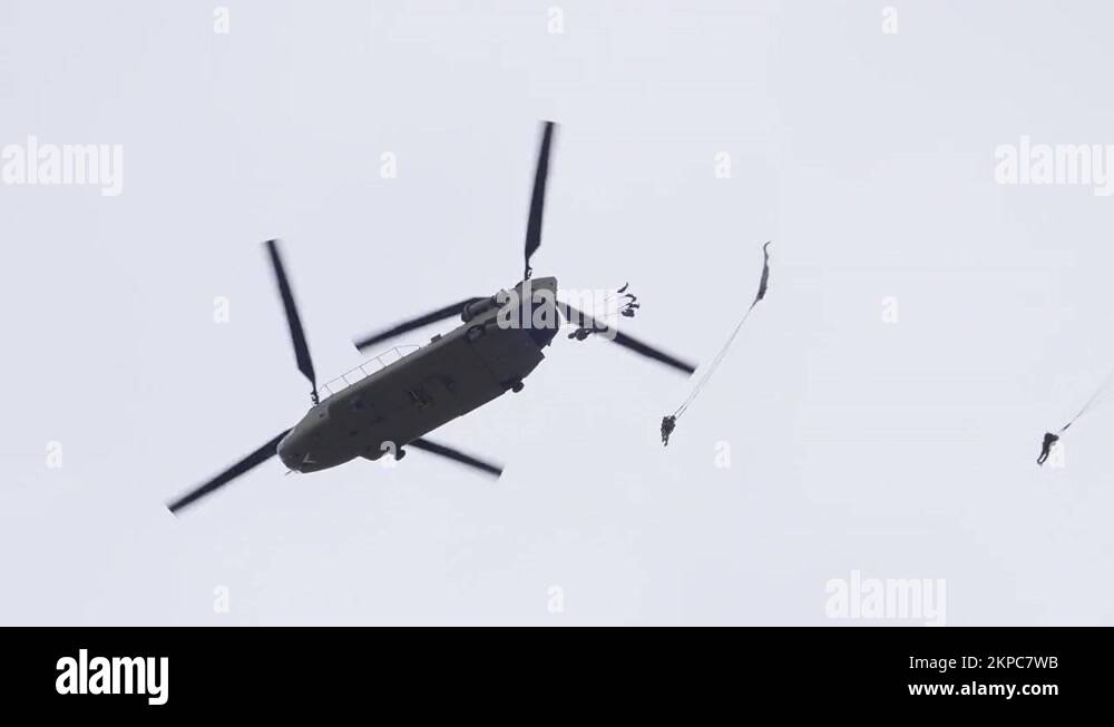 Paratroopers jumping out of Chinook helicopter during training Stock ...