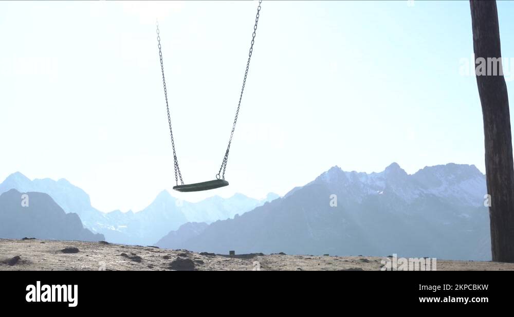 swing moving in the wind in mountain area in Riaño, Leon Spain, without ...