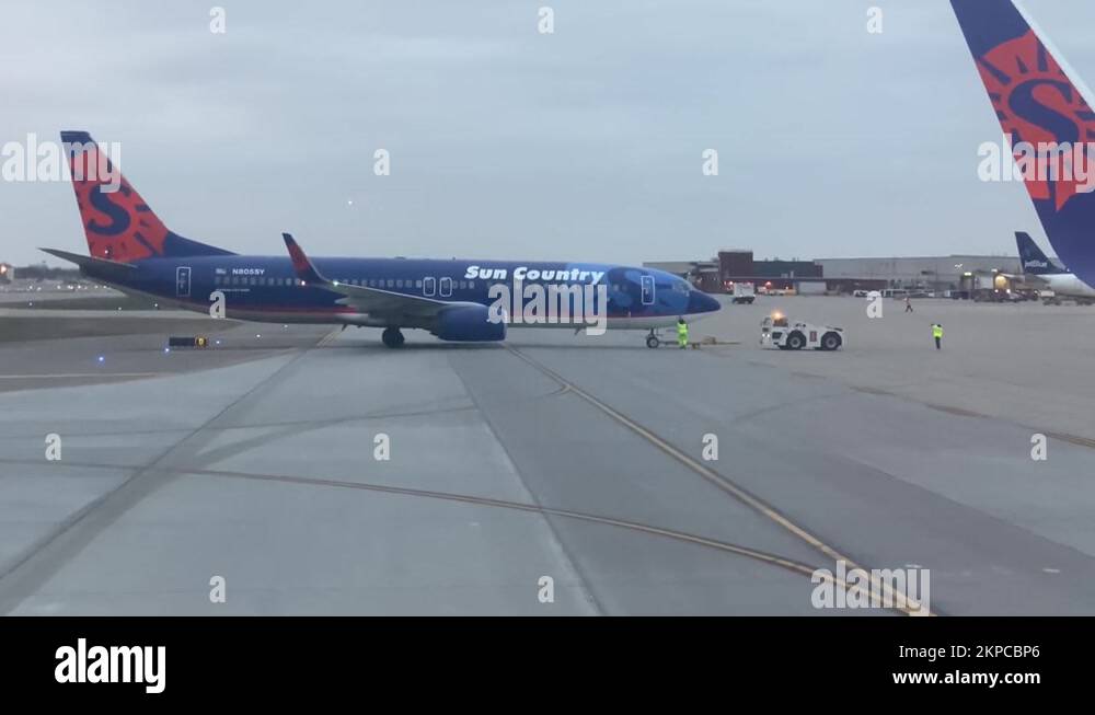 sun country airplane commercial aircraft on a push back at ramp in the ...