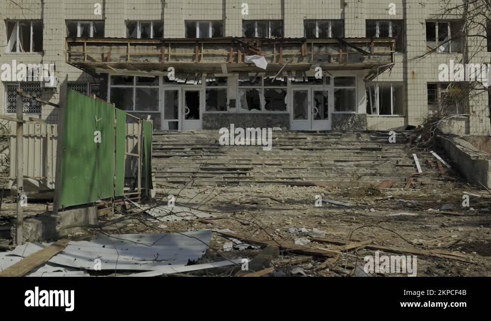 Fixed shot of a building facade in Boutcha, a suburb of Kiev, Ukraine ...