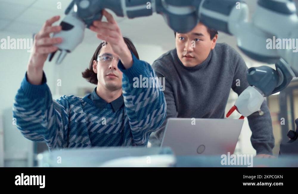 Engineer Look At Screen And Tell Ideas To Colleague Stock Video Footage ...