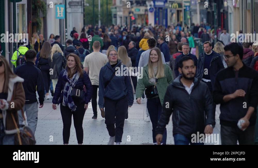 Crowd of people walking through a busy pedestrian zone - Grafton Street ...