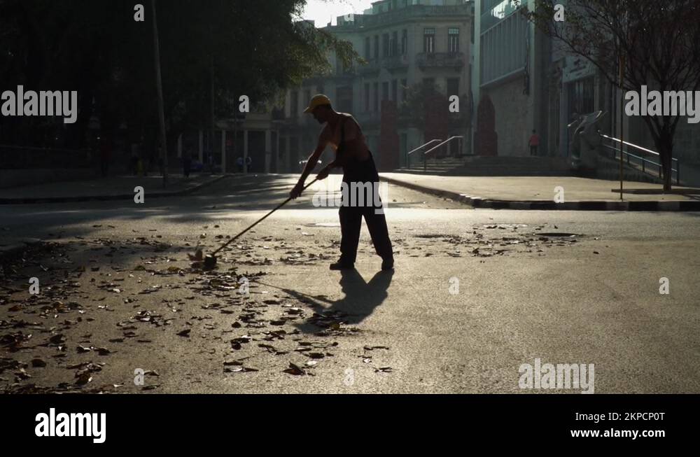 Man sweeping street Stock Videos & Footage - HD and 4K Video Clips - Alamy
