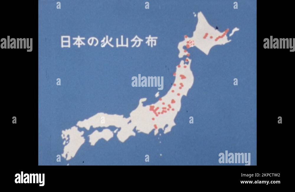 1960s: Red dots cover map of Japan. Clouds of smoke billow into the air ...