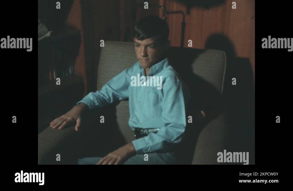Boy in chair Stock Videos & Footage - HD and 4K Video Clips - Alamy