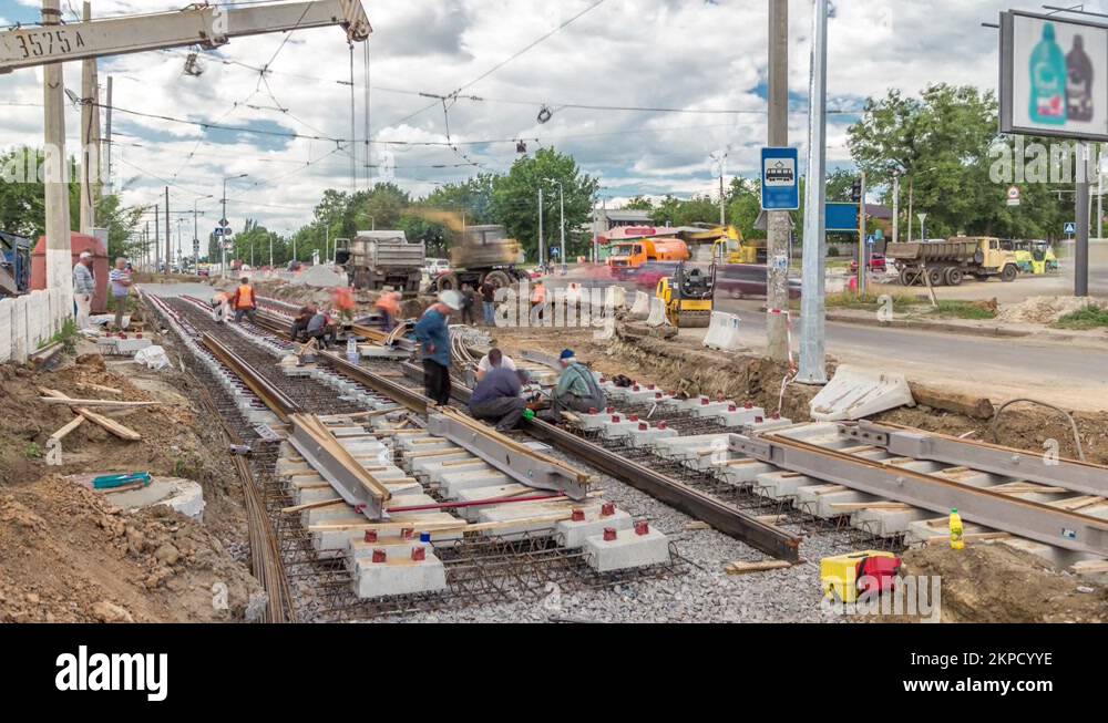 Repair works on the street timelapse. Laying of new tram rails on a ...