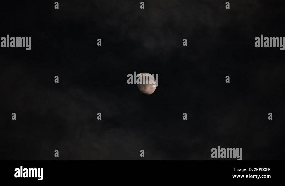 Full moon at night with clouds in real time. Night sky Stock Video ...