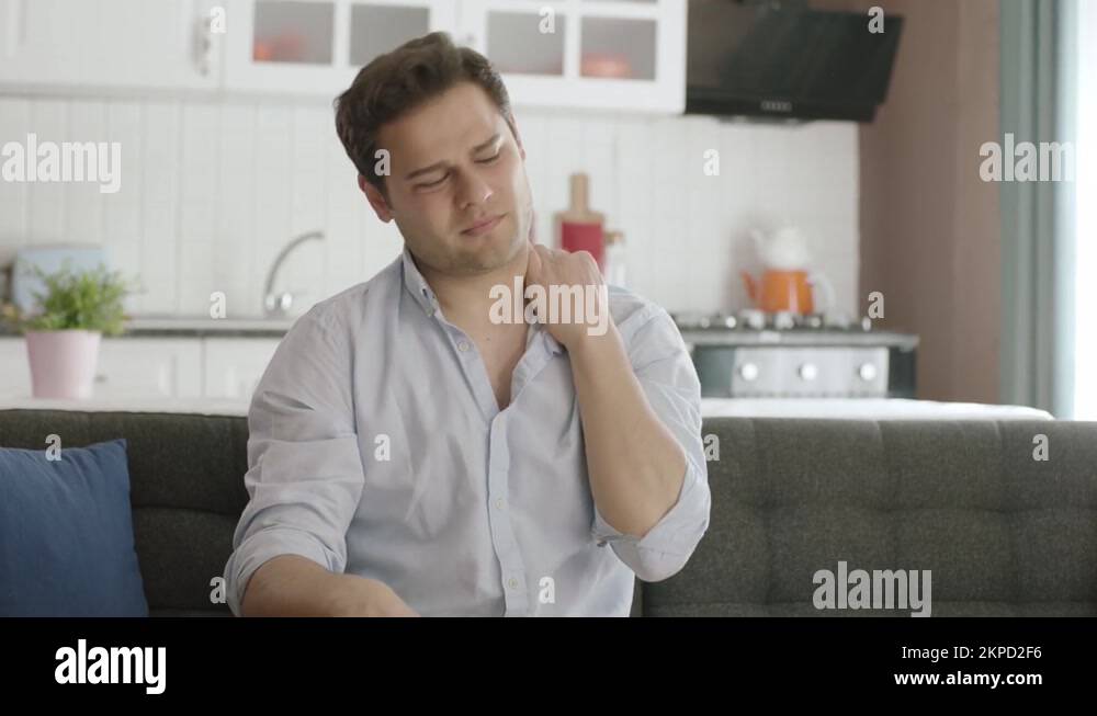 Unhealthy stressed young man suffering from joint pain because of ...