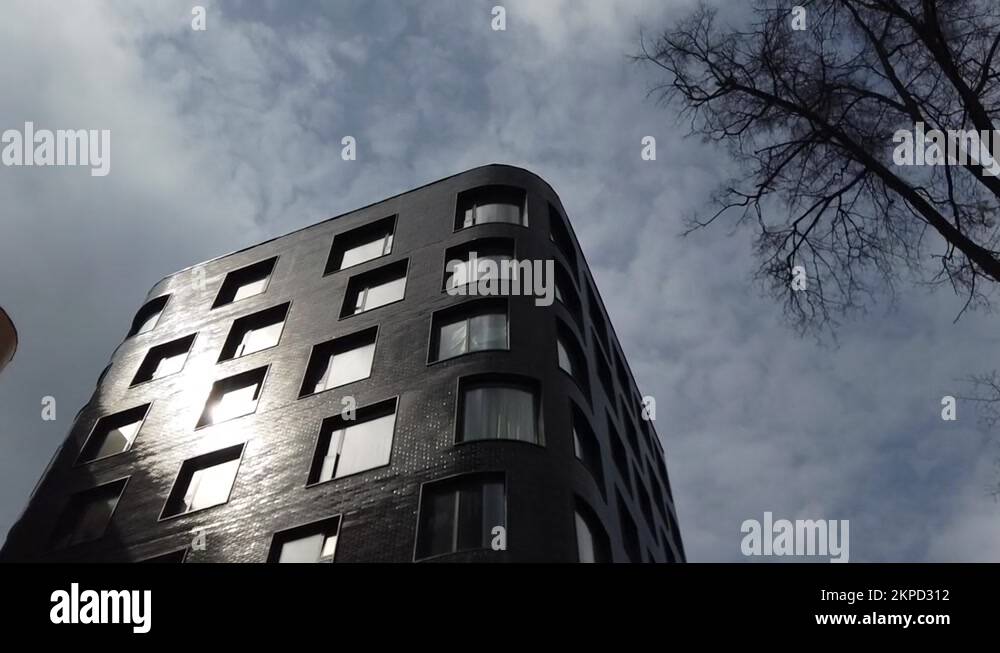 Exterior of a high-rise apartment building facade, windows and ...