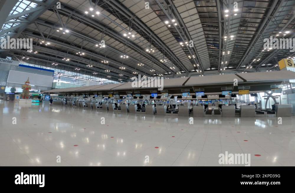 Suwannaphum airport departure hall is nearly empty Stock Video Footage ...