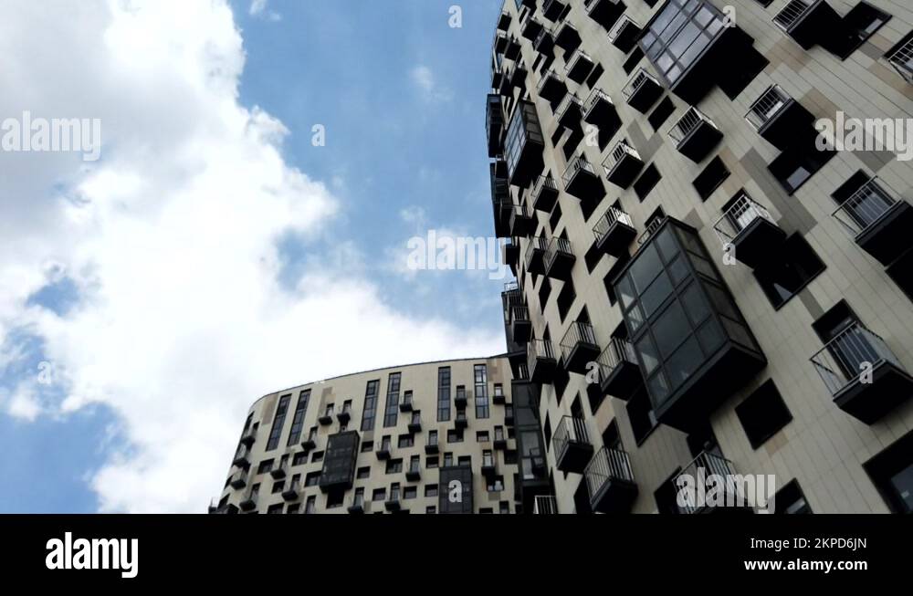 Exterior of a high-rise apartment building facade, windows and ...