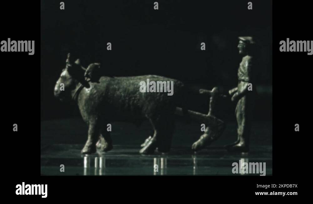 100 BC: Metal sculpture, man, animals wear yoke, pull plow, soldier ...