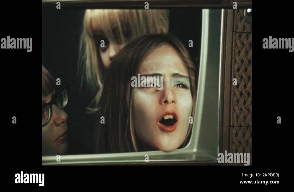 1970s: Crying girl. Girl yelling from inside a television. Various ...
