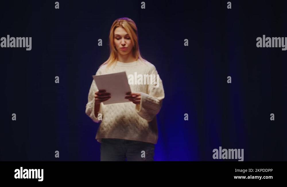 Talent contest. Woman reading jokes on stage. Female comedian speaking ...