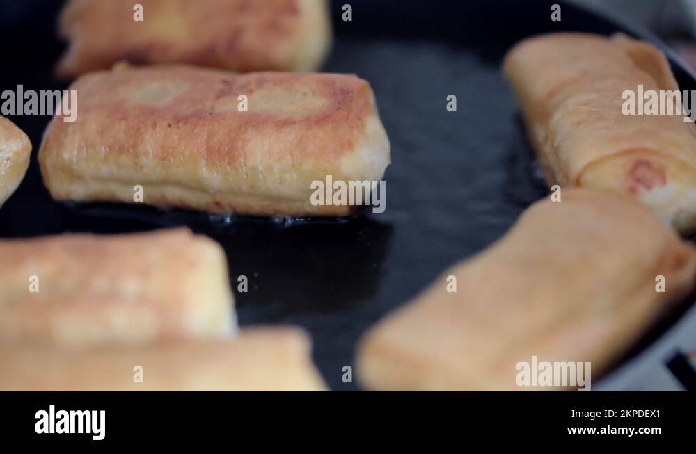 Frying Pancakes With Cheese On Pan. Chinese Dim Sum, Spring Roll On Pan ...
