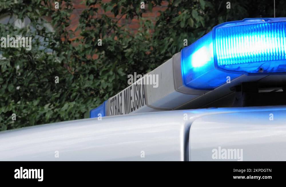 Close Up Of Lightbar Mounted On Roof Of A Police Car With Blue Lights ...