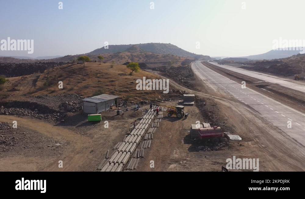 Flying Over Construction Workers Barracks Beside The New Expressway ...