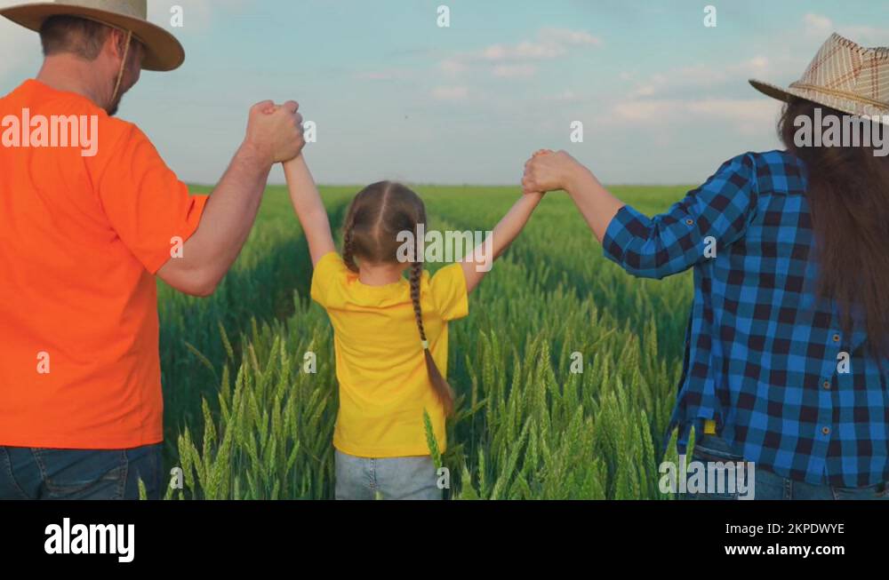 Farmer family, Child playing with mother, father. Happy family with ...