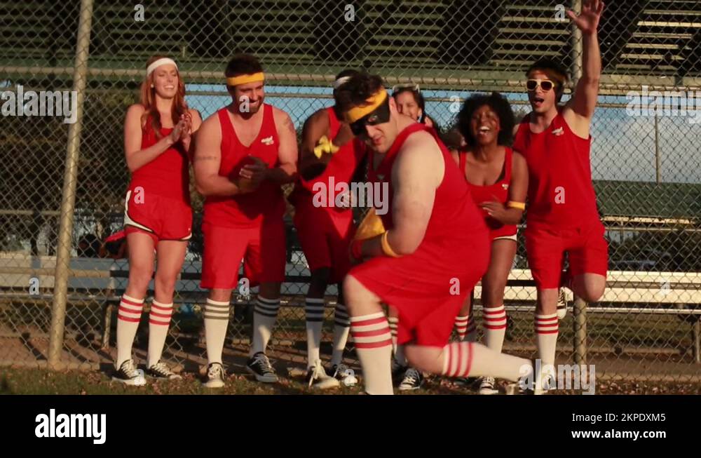 Team captain wearing mask celebrating with cheering teammates Stock ...