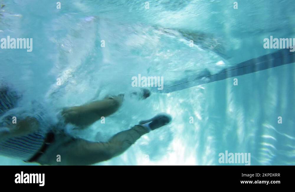 Frustrated man falling into swimming pool then surfacing Stock Video ...