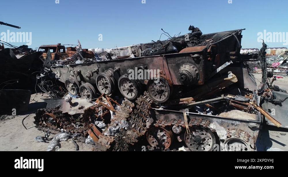 Destroyed military convoy. Burnt combat vehicles. Rusty tech Stock ...