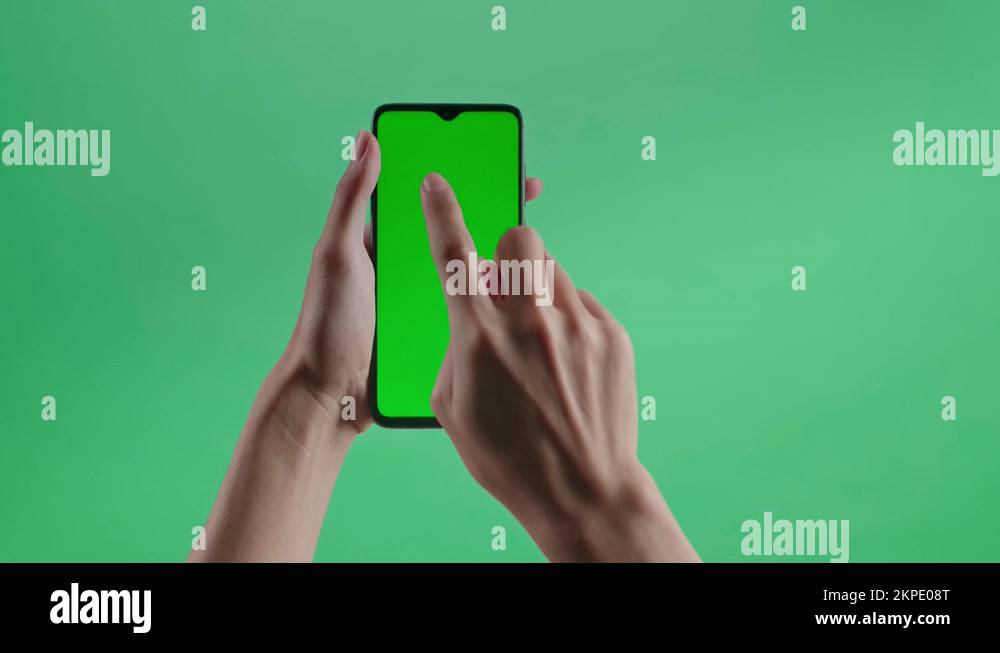 Hand Tap Touch Green Screen Smartphone On The Green Screen Background ...