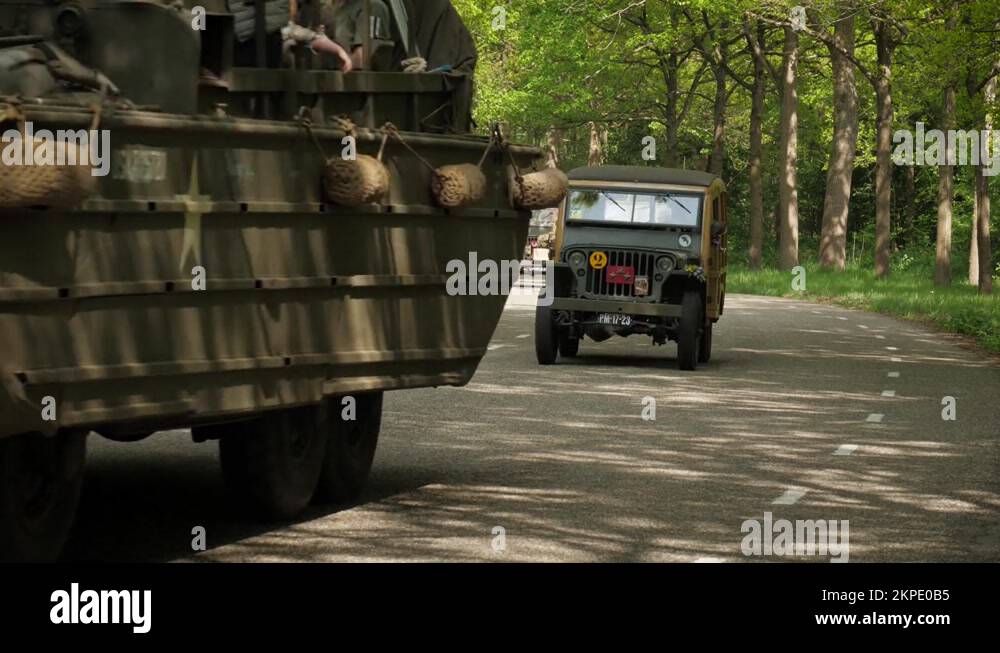 Liberation parade with allied military vehicles from the end of WW2 ...