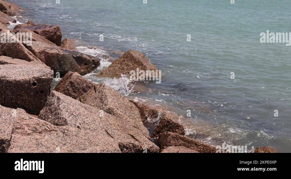 Rock breakwater pier ocean water coast Gulf of Mexico Texas 4K Stock ...