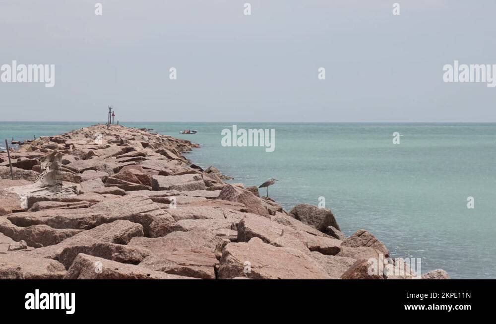 Seawall rock pier fishing boat Gulf of Mexico Texas 8K Stock Video ...