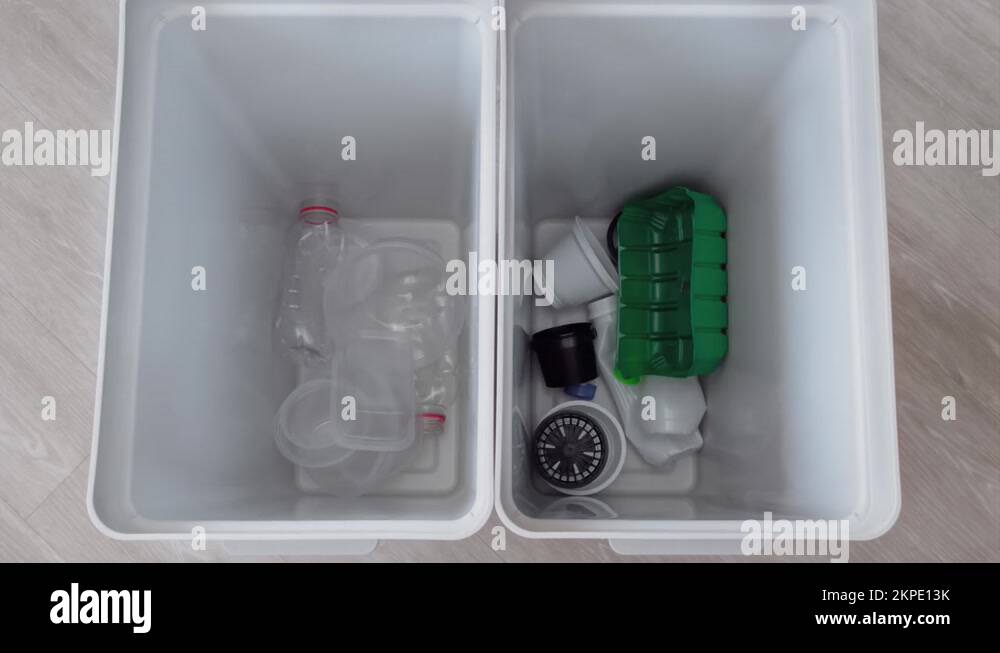 Stop motion animation: sorting of garbage in two recycling bins - top view Stock Video Footage ...