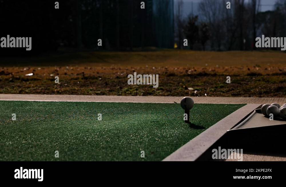 Golf Club Driver Hitting the Golf Ball in Slow Motion in Driving Range ...