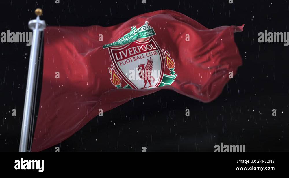 Flag of Liverpool Football Club Waving with rain and snow in the night ...