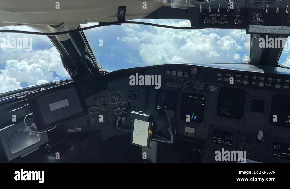 Jet cockpit view from the captain side, daylight, while overflying some ...